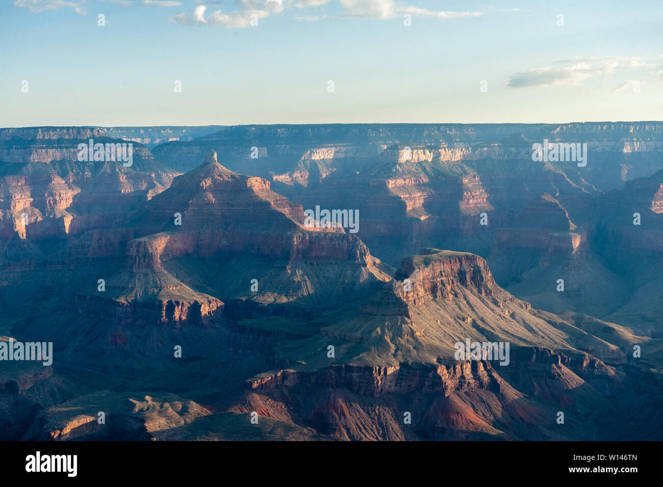 The rising sun over the grand canyon near Yavapai Point, on the ...