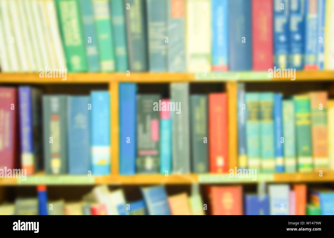 blurry library bookshelves background. in school education learning ...