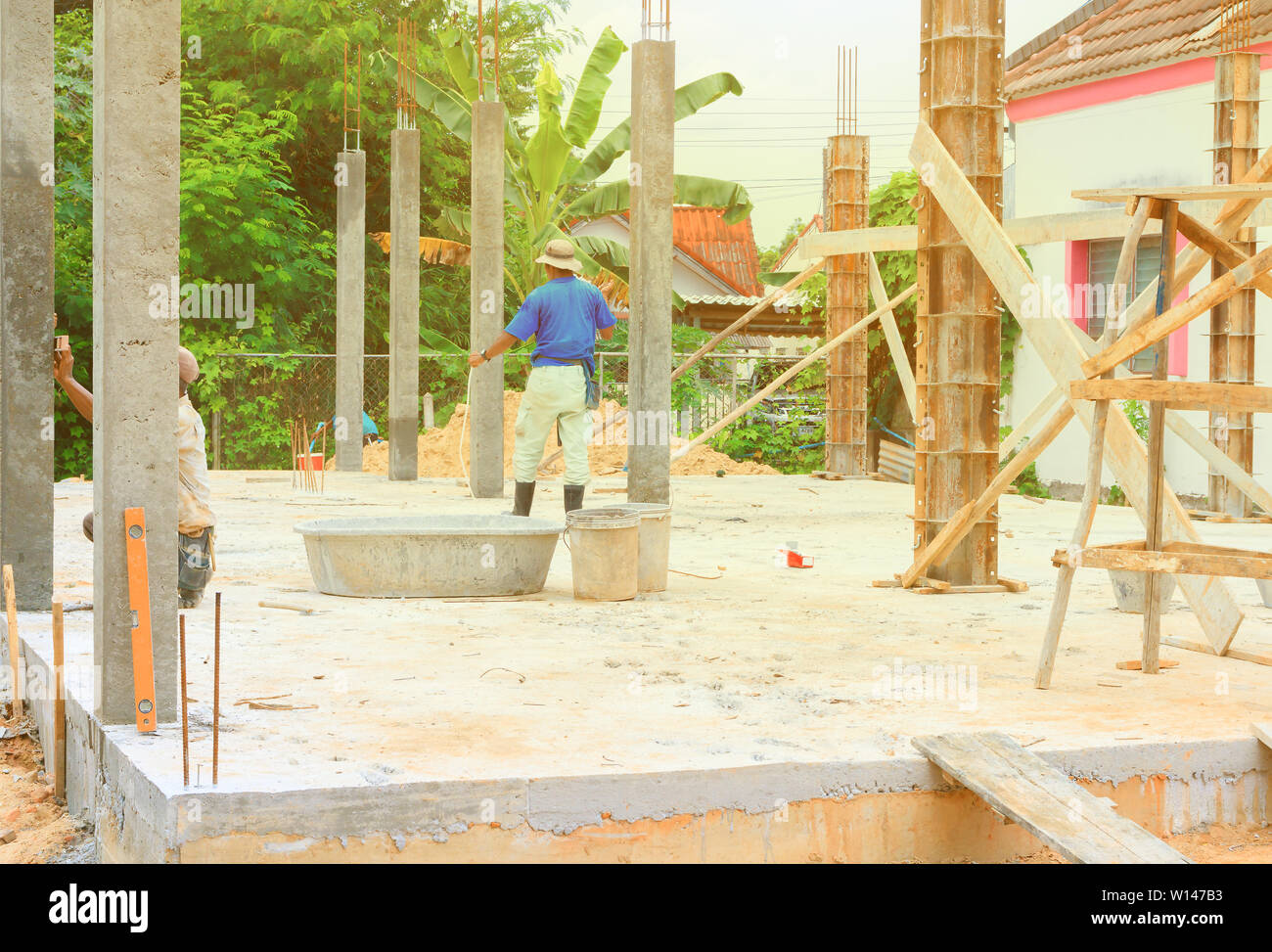 construction workers collaborating in the installation formwork ...