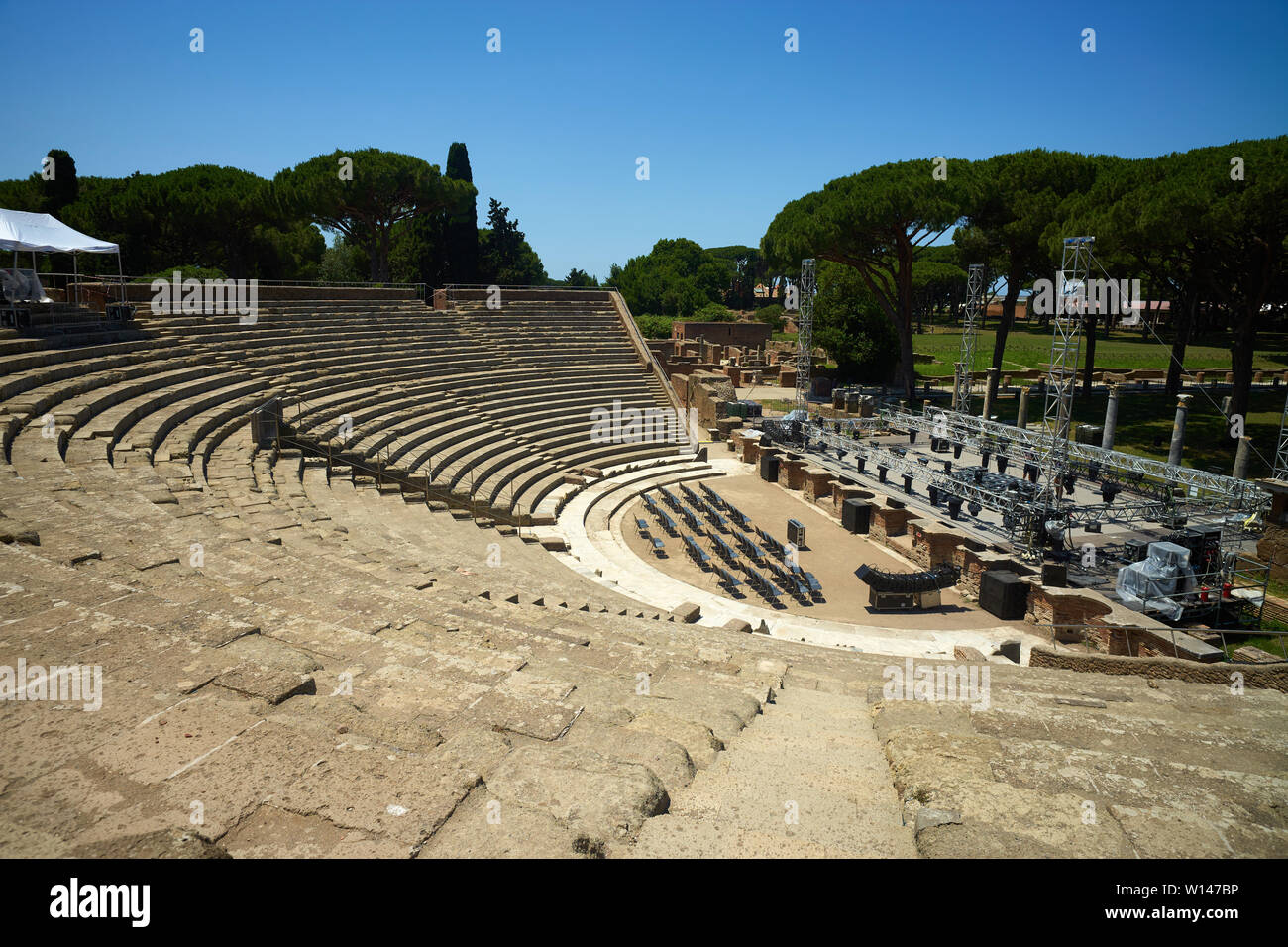 Ancient theatre at Ostia Antica ith a modern concert being setup Stock ...
