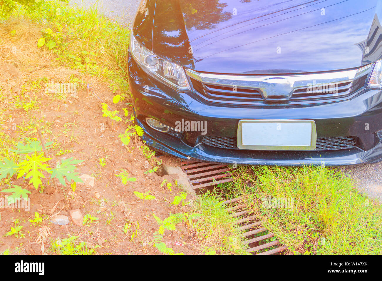 accident car fall ditch on the road Stock Photo - Alamy