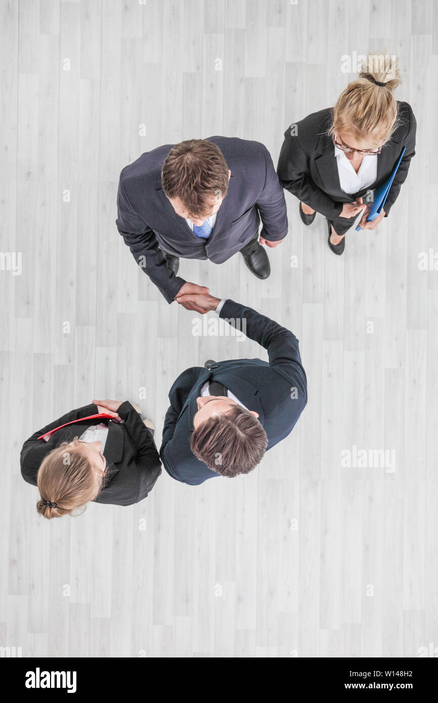 Top view people shake hands hi-res stock photography and images - Alamy