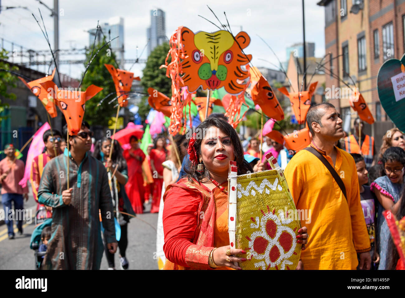 London, UK. 30 June 2019. People take part in a parade during Boishakhi ...