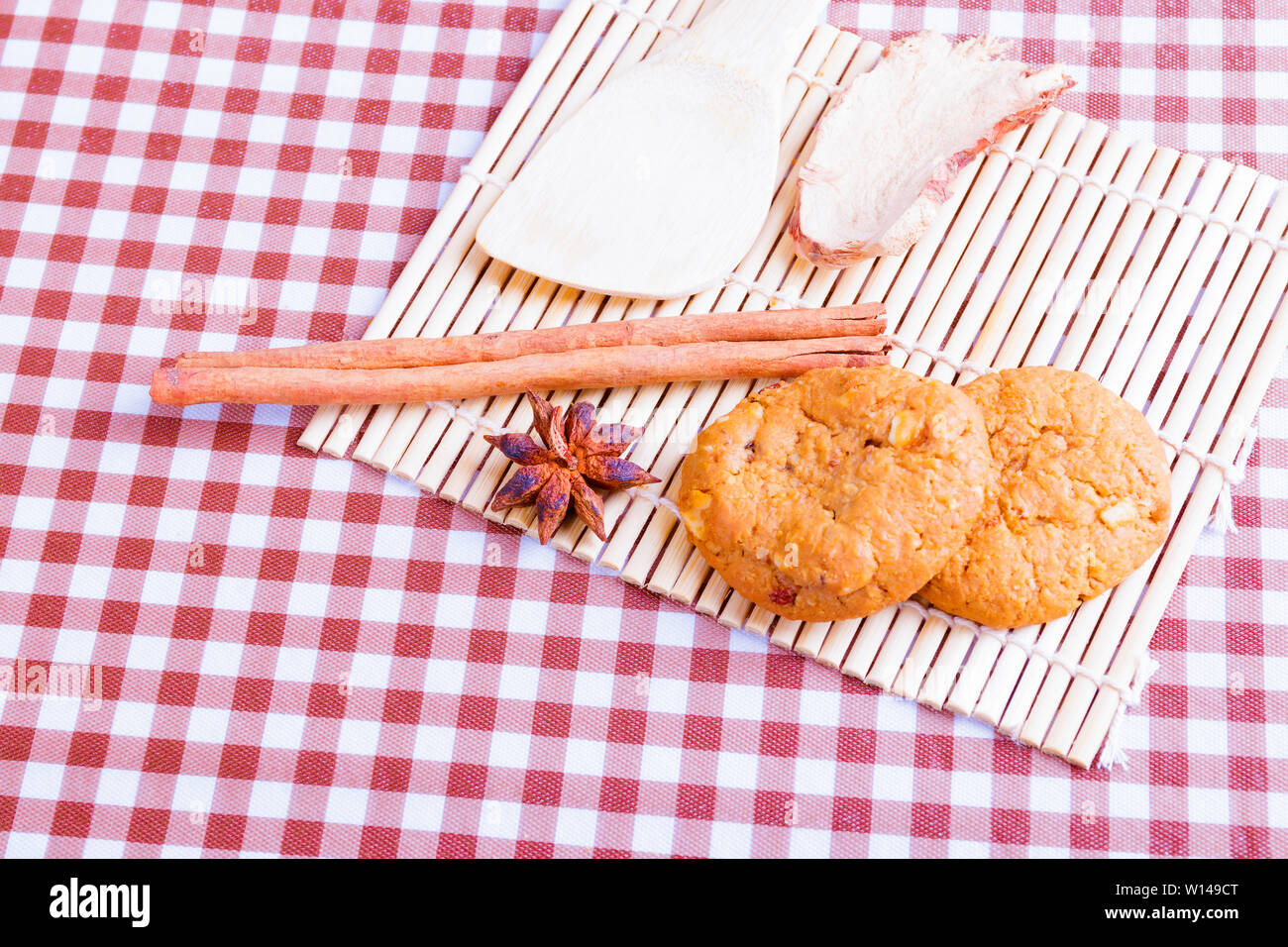cereal cookies with spoon spice on wooden bamboo and tablecloth copy ...