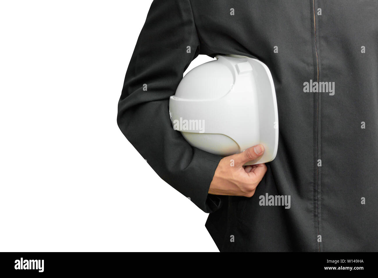 hand of engineering worker holding white safety helmet plastic ...