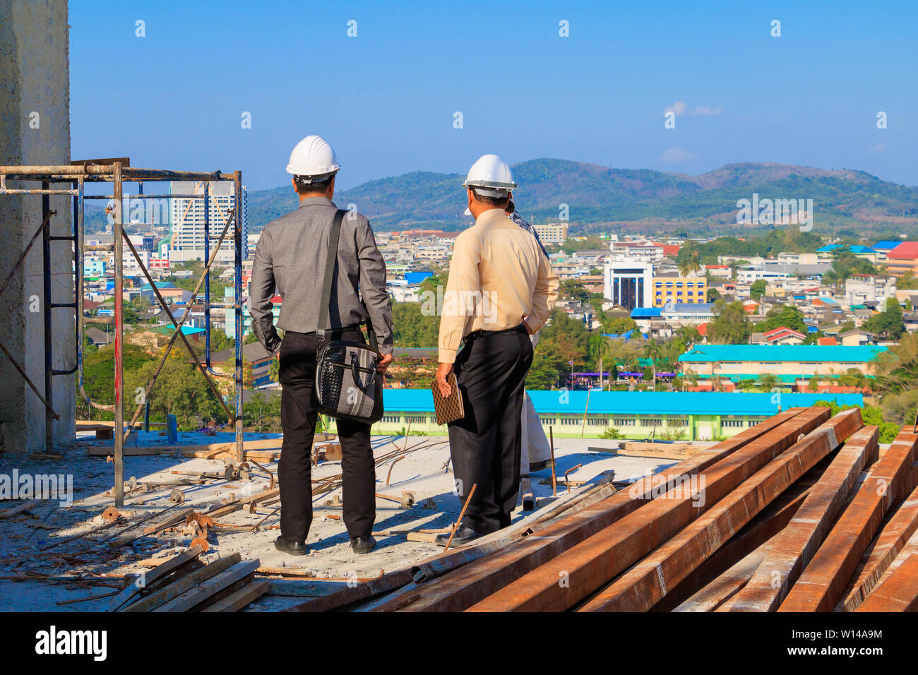 engineer consult construction site To plan development on housing High ...