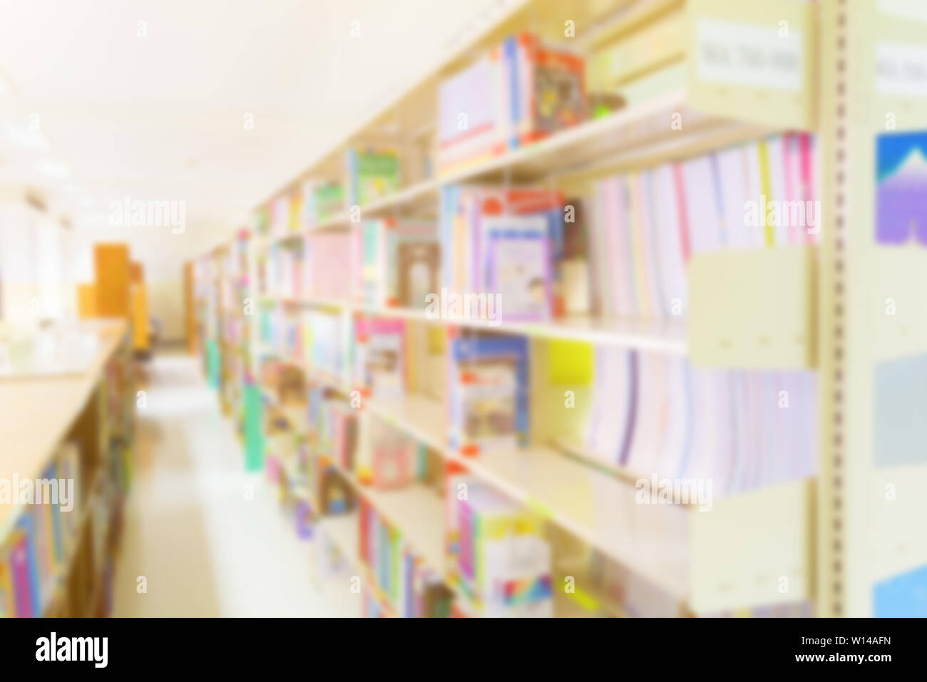 blurry library bookshelves background. in school education learning ...