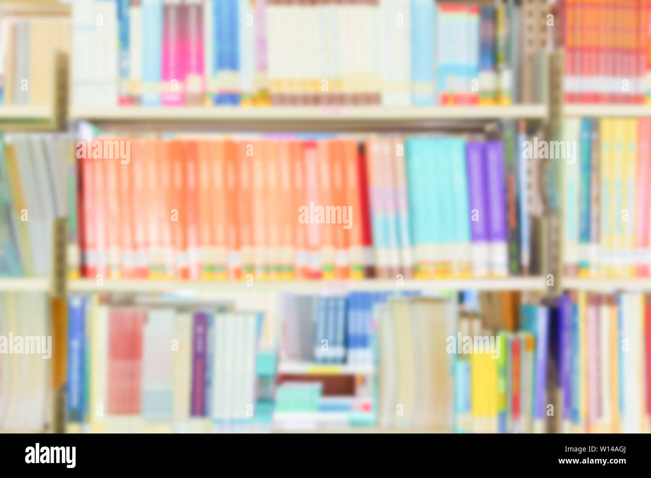 blurry library bookshelves background. in school education learning ...