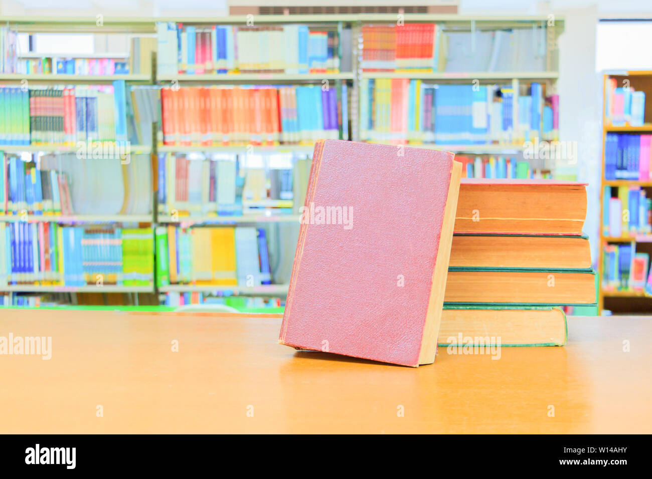 old book red - green. heap are interior library school on wooden table ...