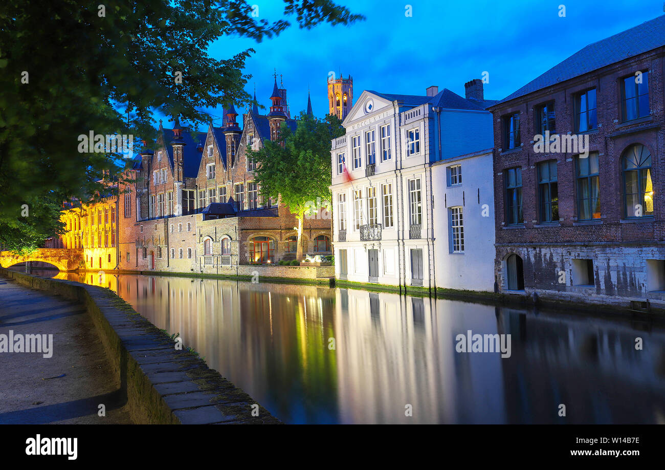 Scenic city view of Bruges canal with beautiful medieval colored houses ...