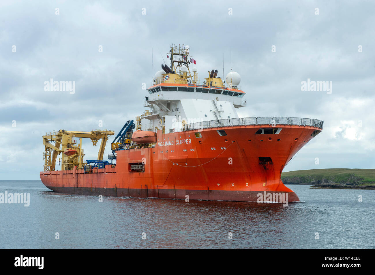 Normand Clipper berthing and putting ashore decommissioned oil rig ...
