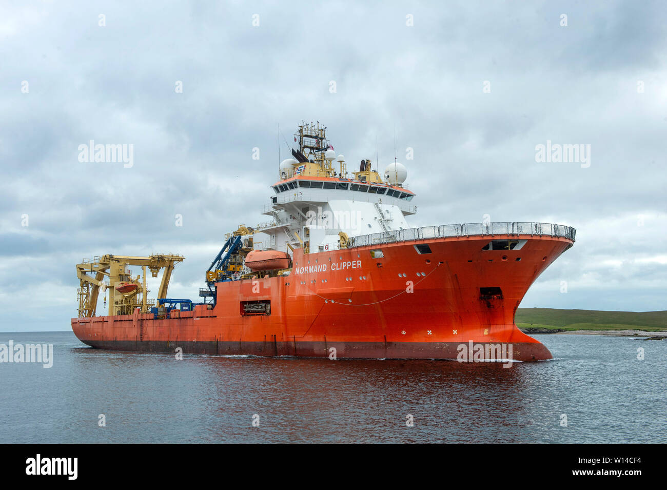 Normand Clipper berthing and putting ashore decommissioned oil rig ...