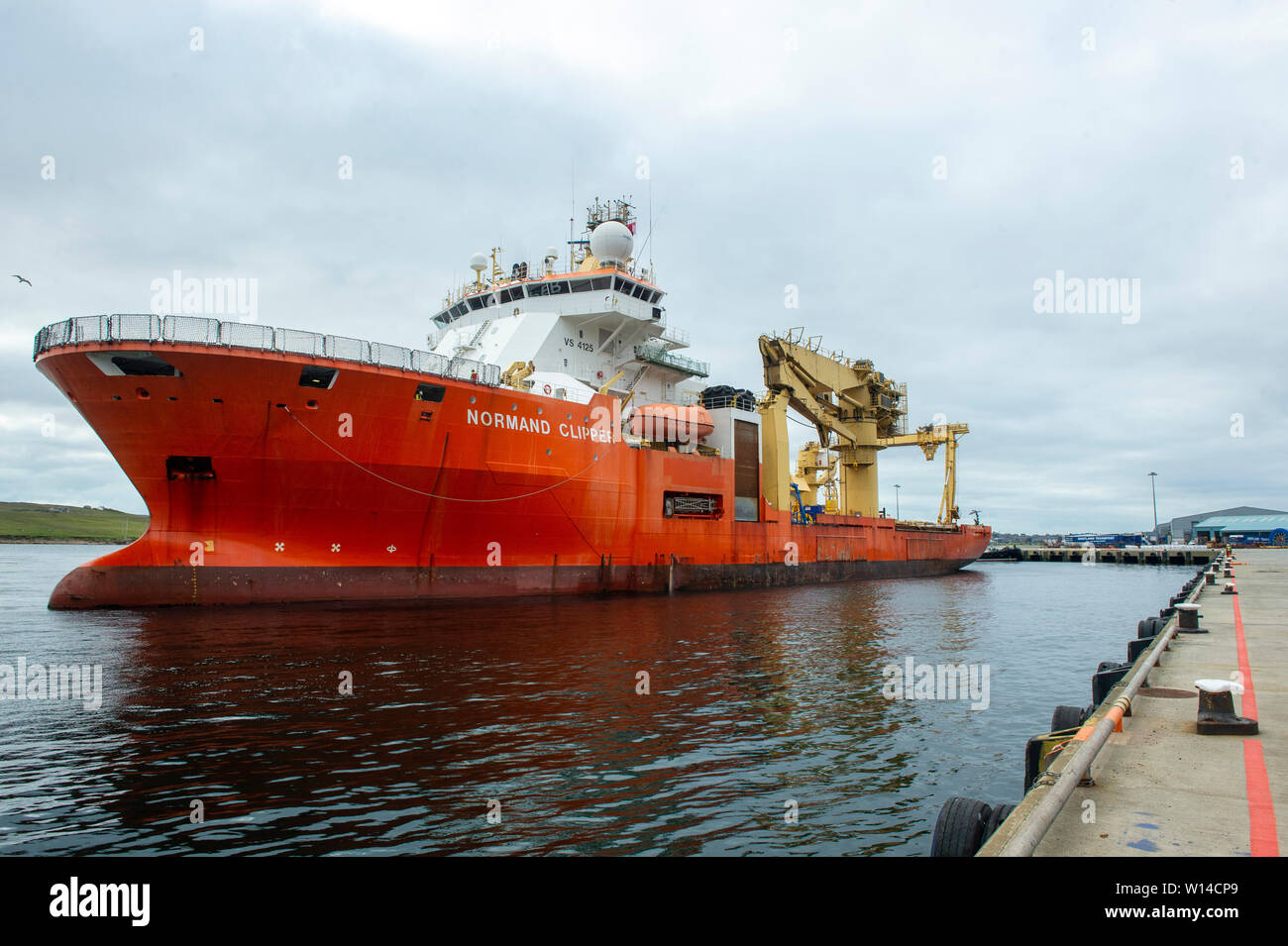 Normand Clipper berthing and putting ashore decommissioned oil rig ...