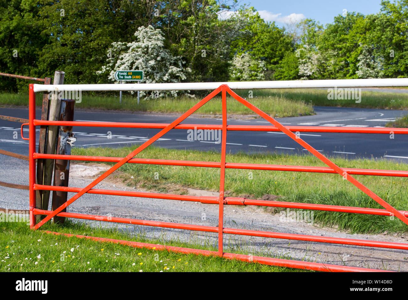 A red farm gate on the outskirts of Kendal, Cumbria, UK Stock Photo - Alamy