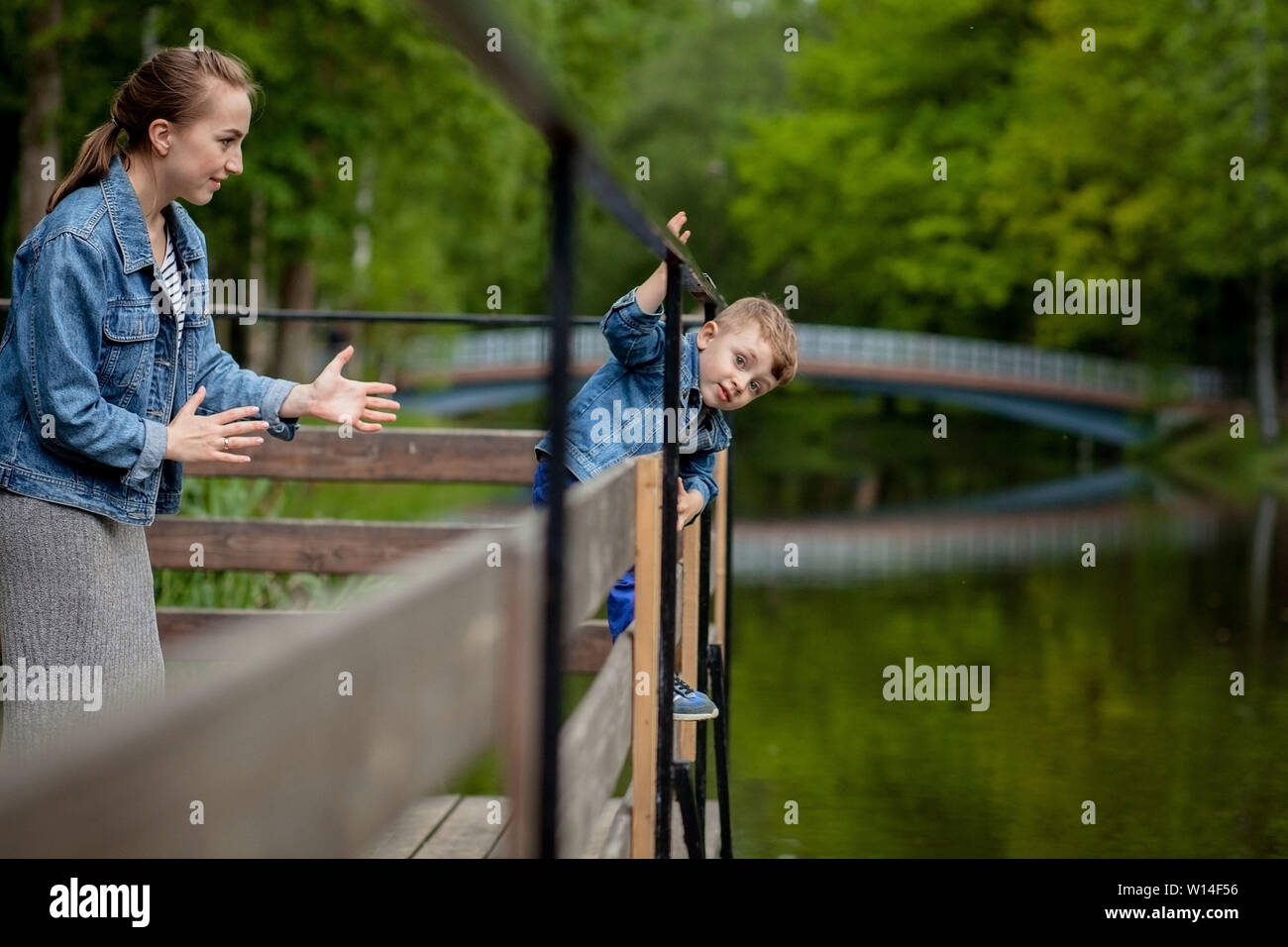 Mother is experiencing that the child will fall into the water. A ...