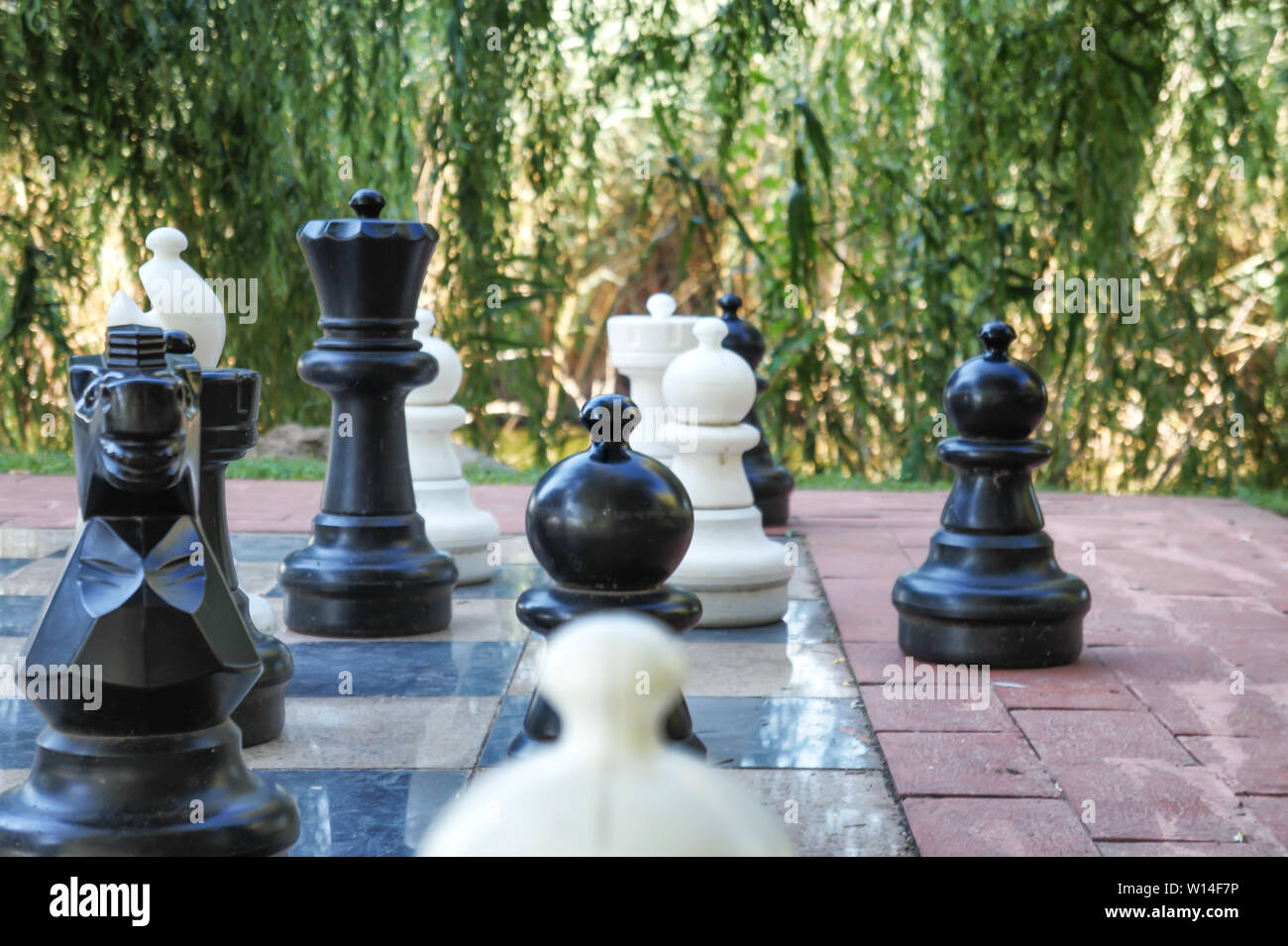Giant garden chess pieces Stock Photo - Alamy