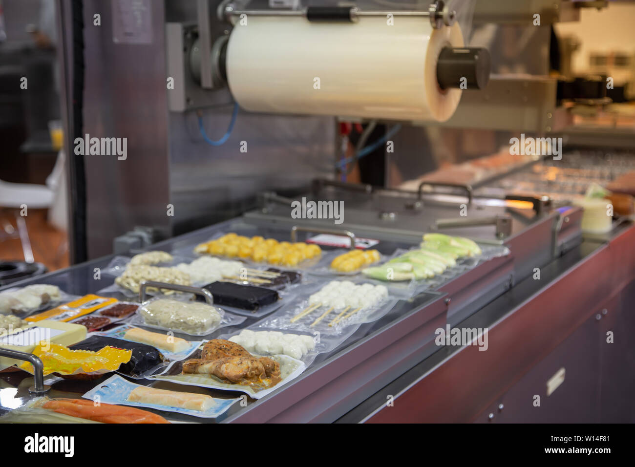 Vacuum sealing manufacturing hi-res stock photography and images - Alamy