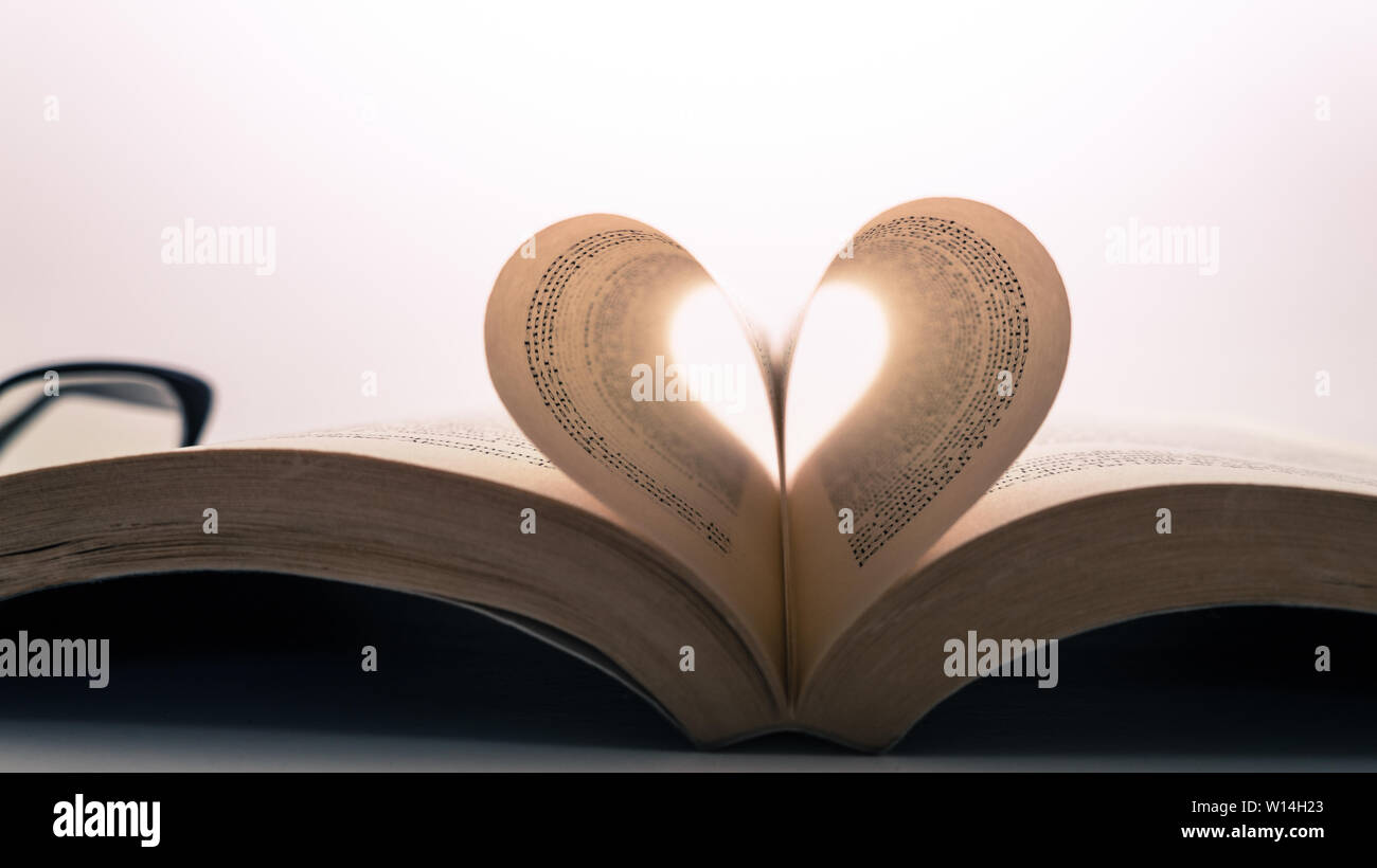 Heart shape book Stock Photo - Alamy