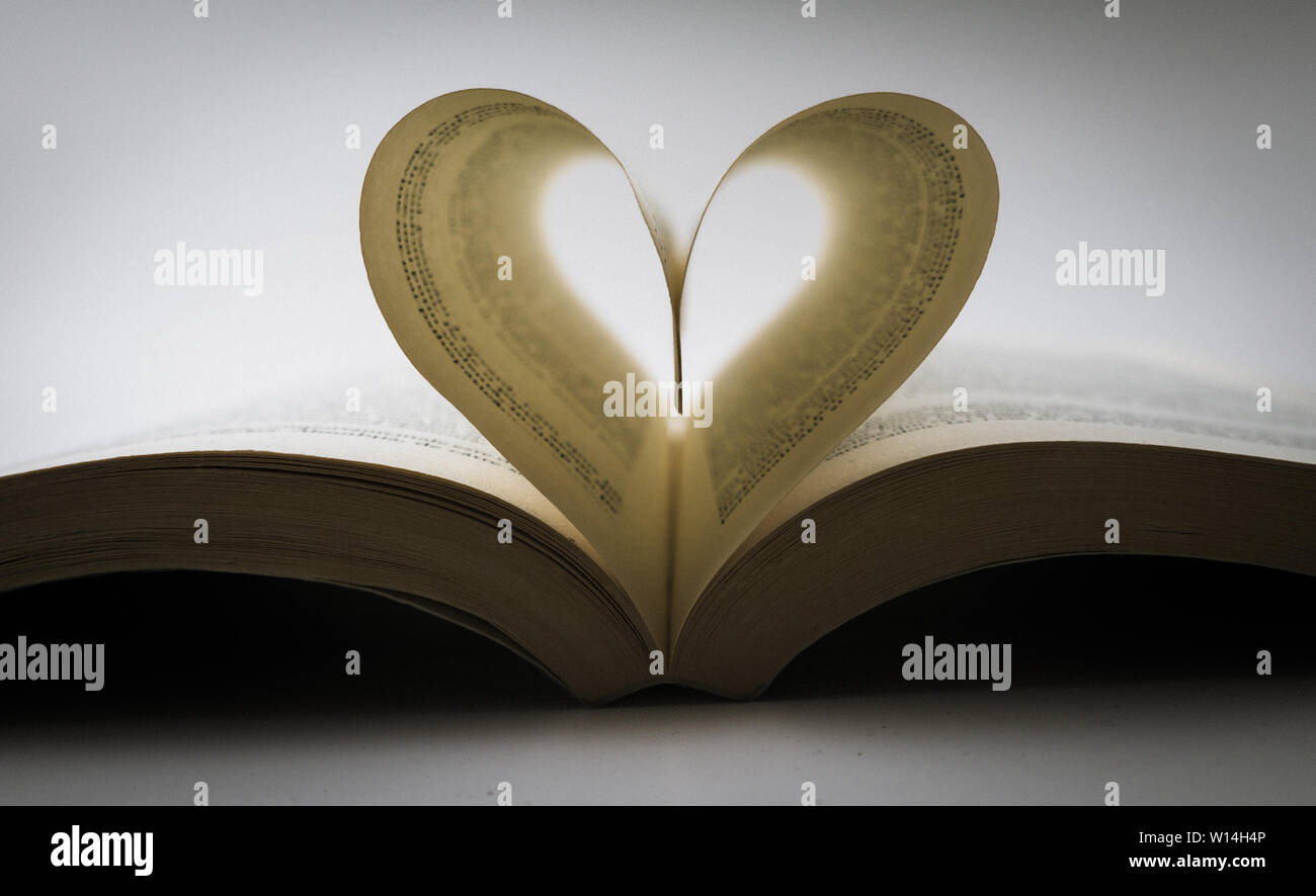 Heart shape book Stock Photo - Alamy