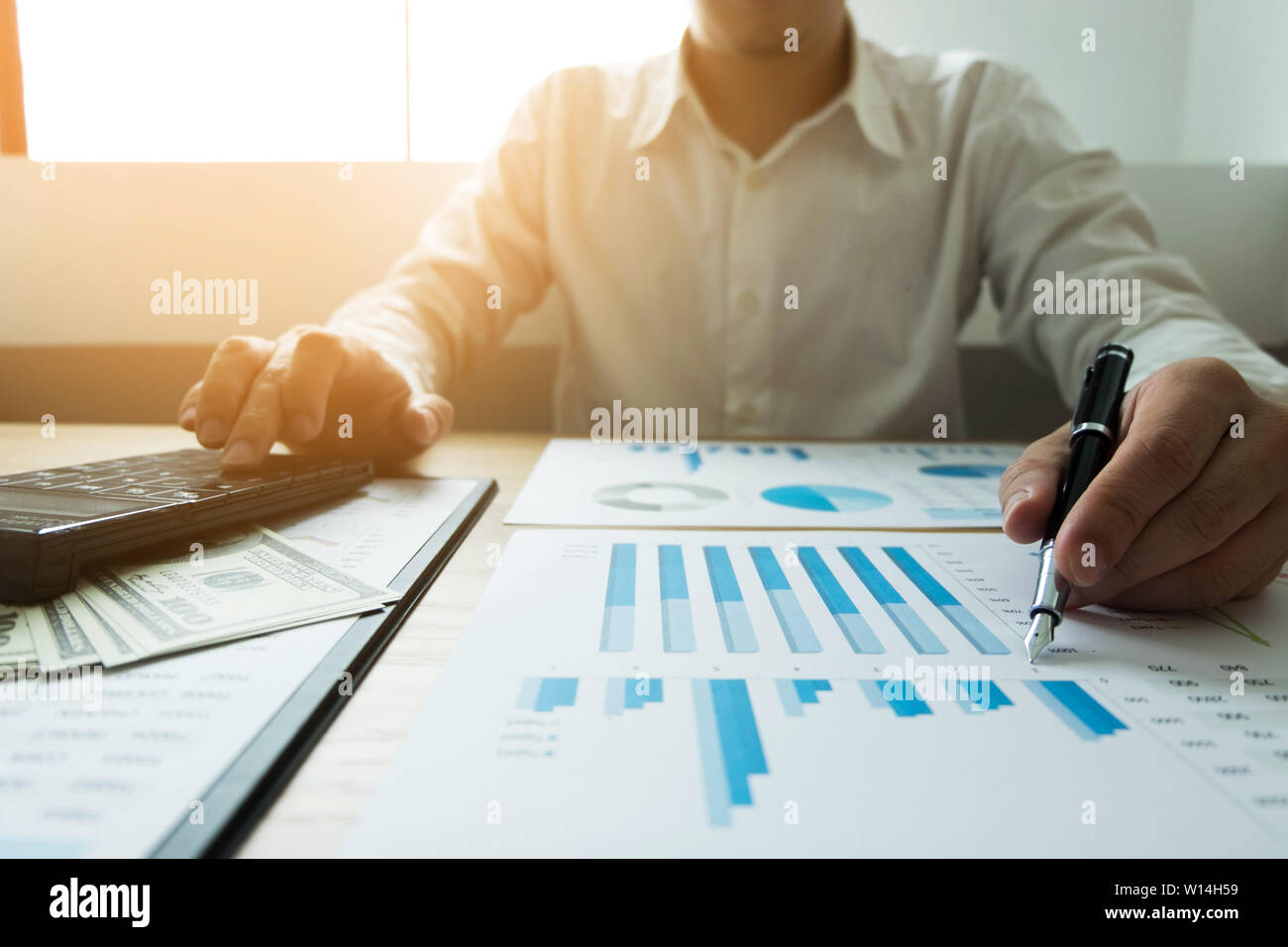 Businessmen calculate earnigs business performance, business concept ...