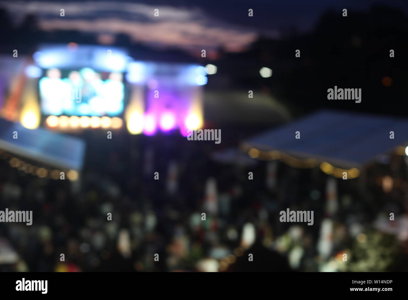 Defocused background of open air music festival concert event. Blurred ...