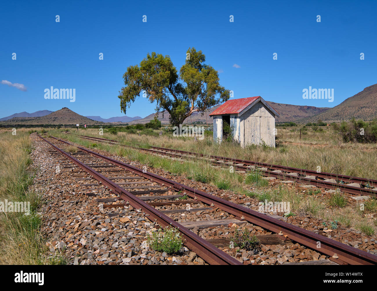 No longer in usage Dwarsfeld train station in the Karoo region of South ...