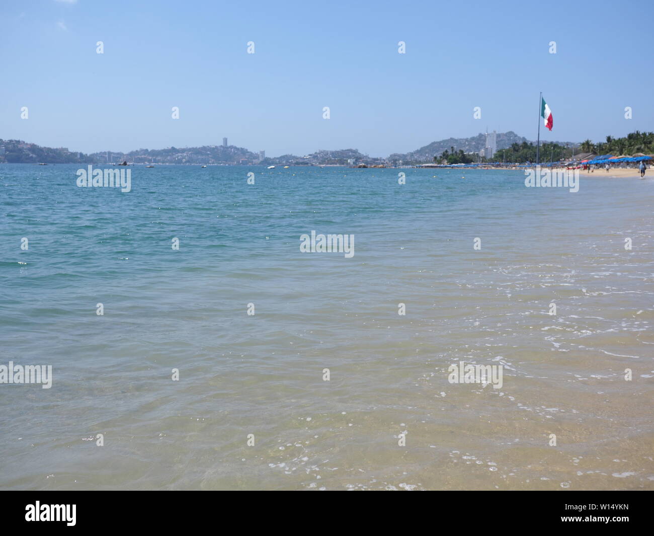 Panoramic bay with large mexican national flag of ACAPULCO city in ...