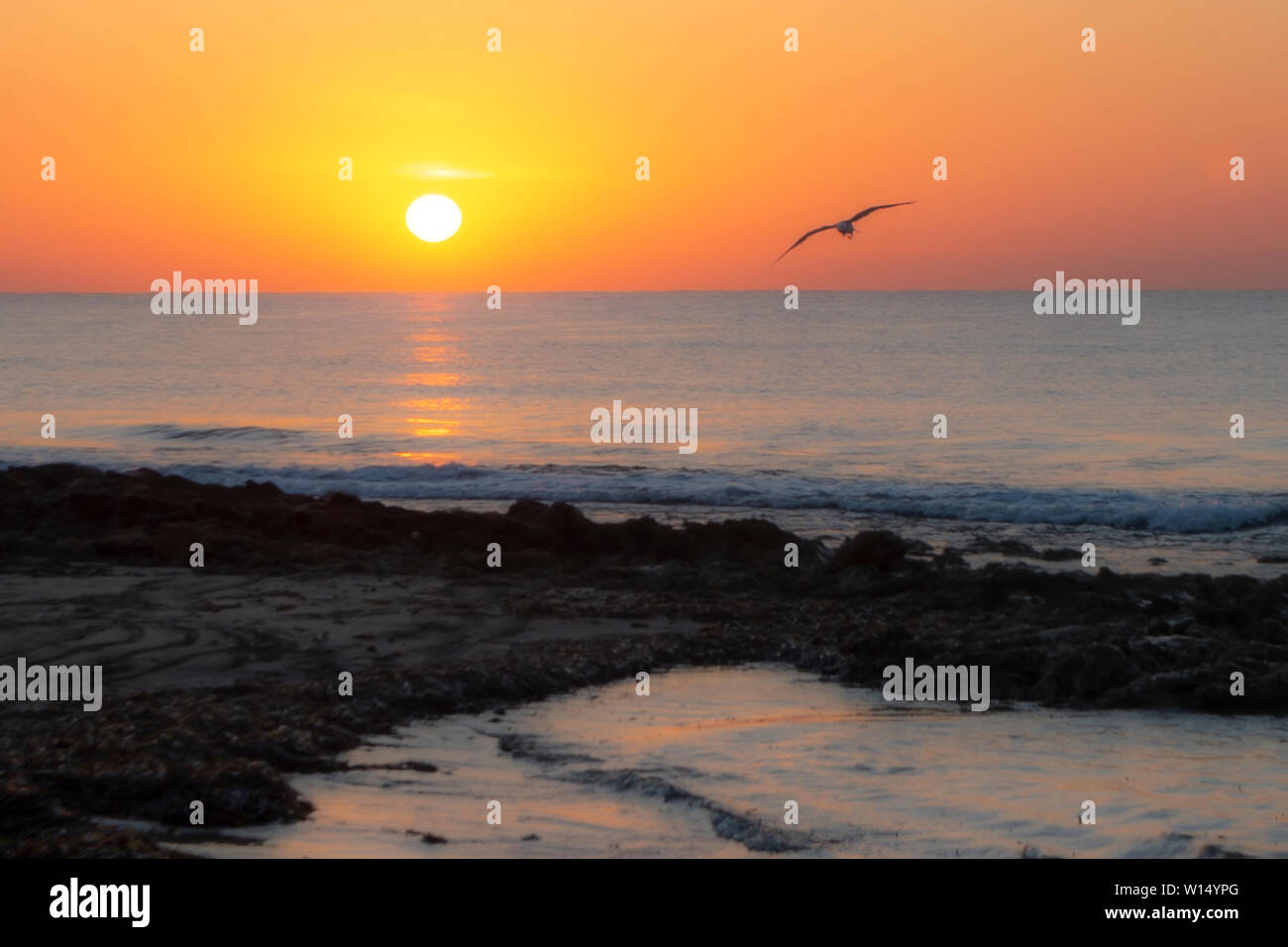 Beach and sunset in Spain Stock Photo - Alamy