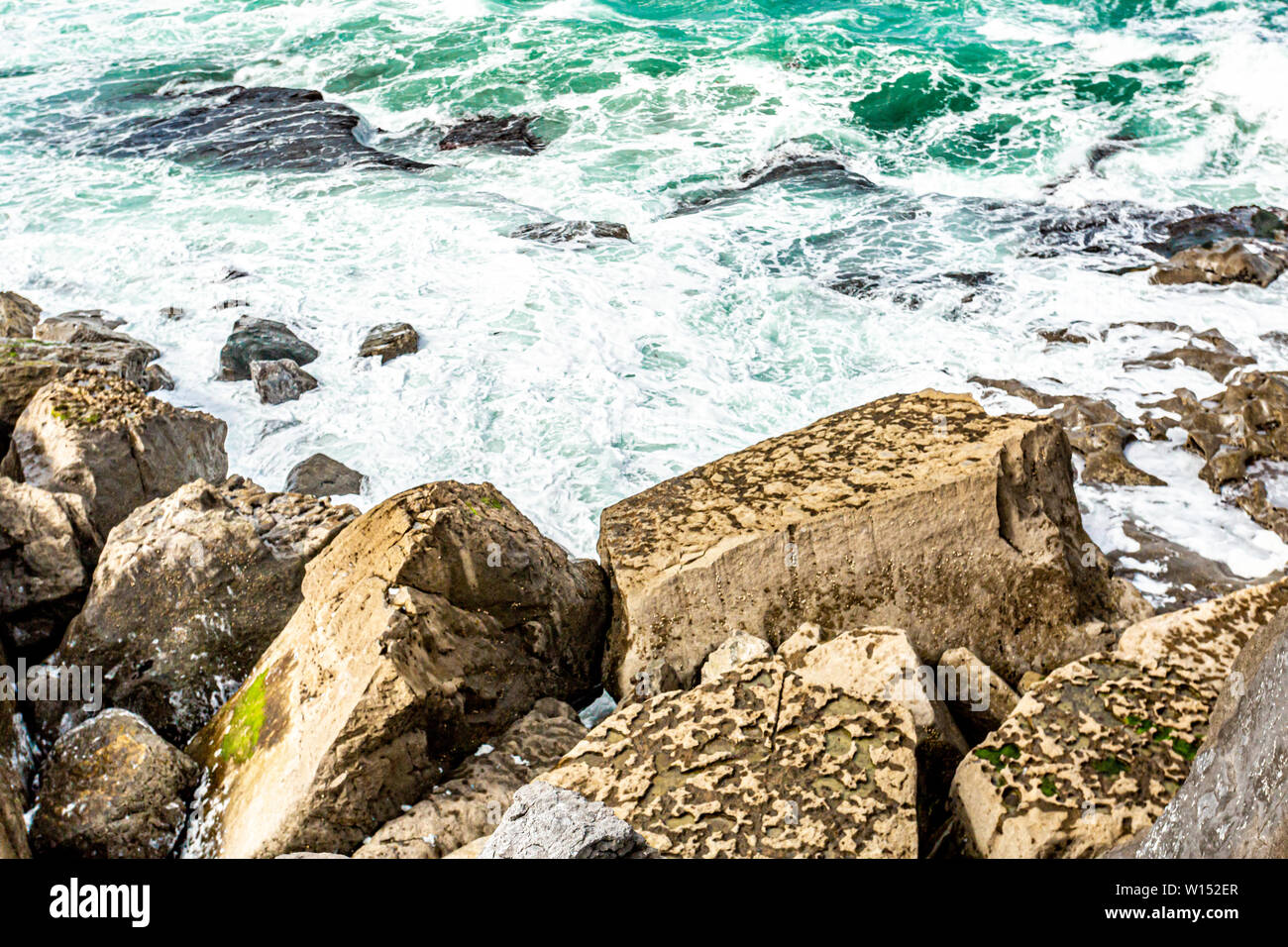 Eroded limestone rocks caused by the sea in Bothar nA hAillite ...