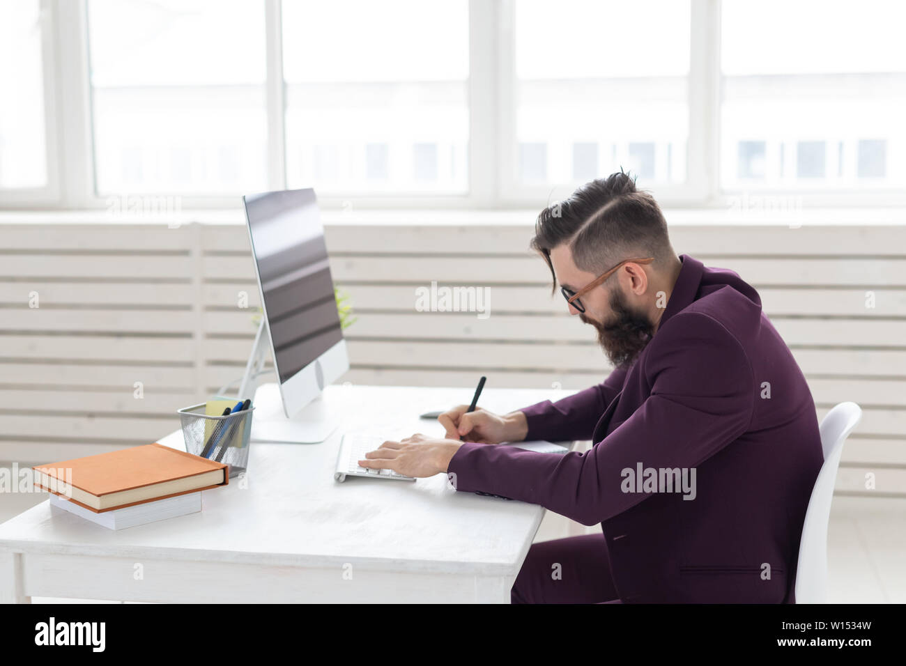 people, design and style concept - graphic designer sketching new ...