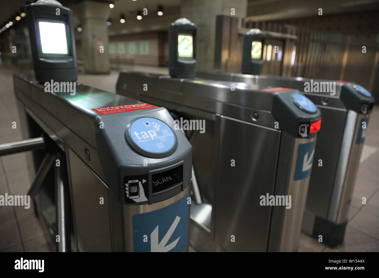 The tap fare gates at the Union Station subway station in Los Angeles ...