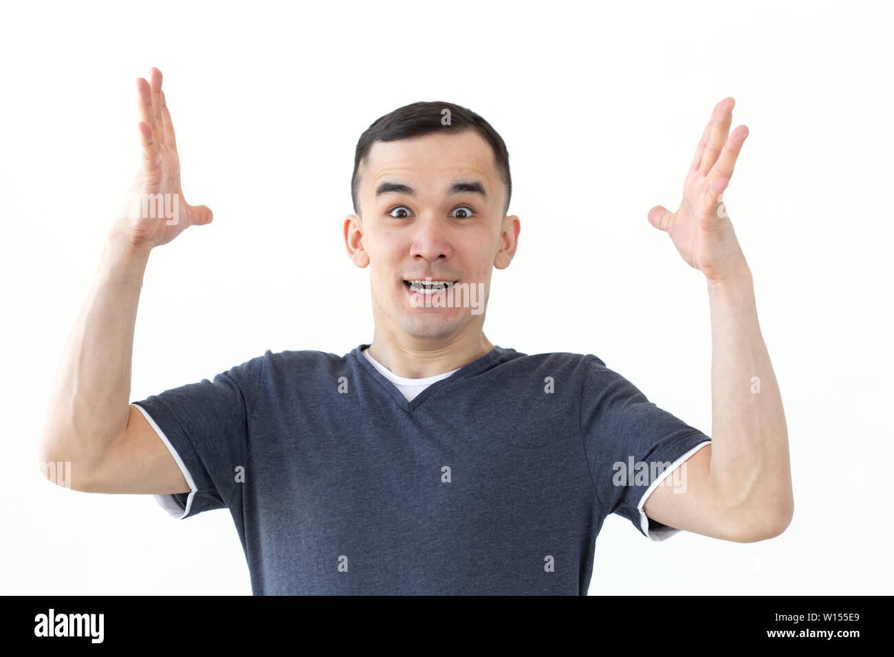 People, gesture and fashion concept - excited angry asian man isolated ...