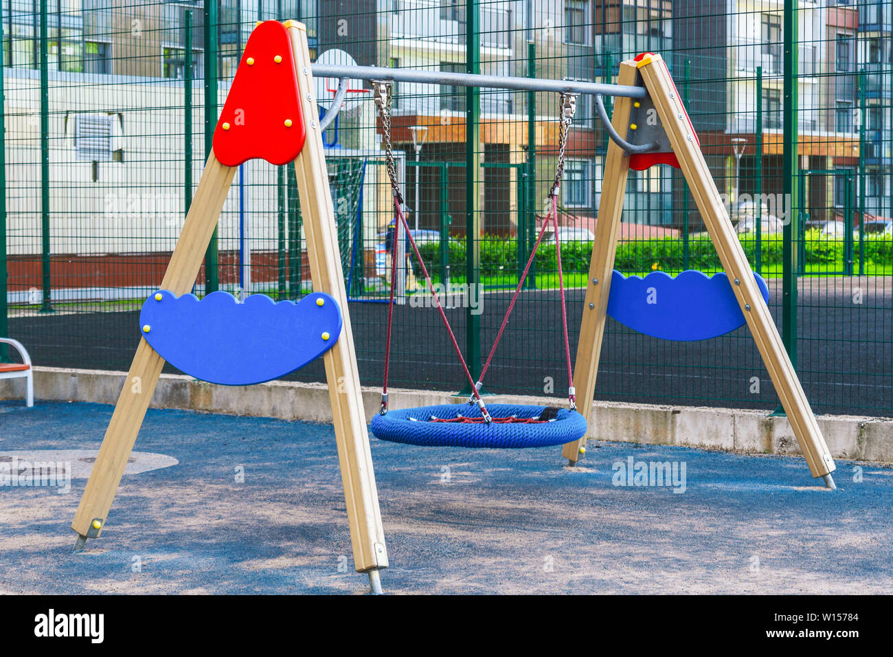 Children playground on yard activities in public park surrounded by ...