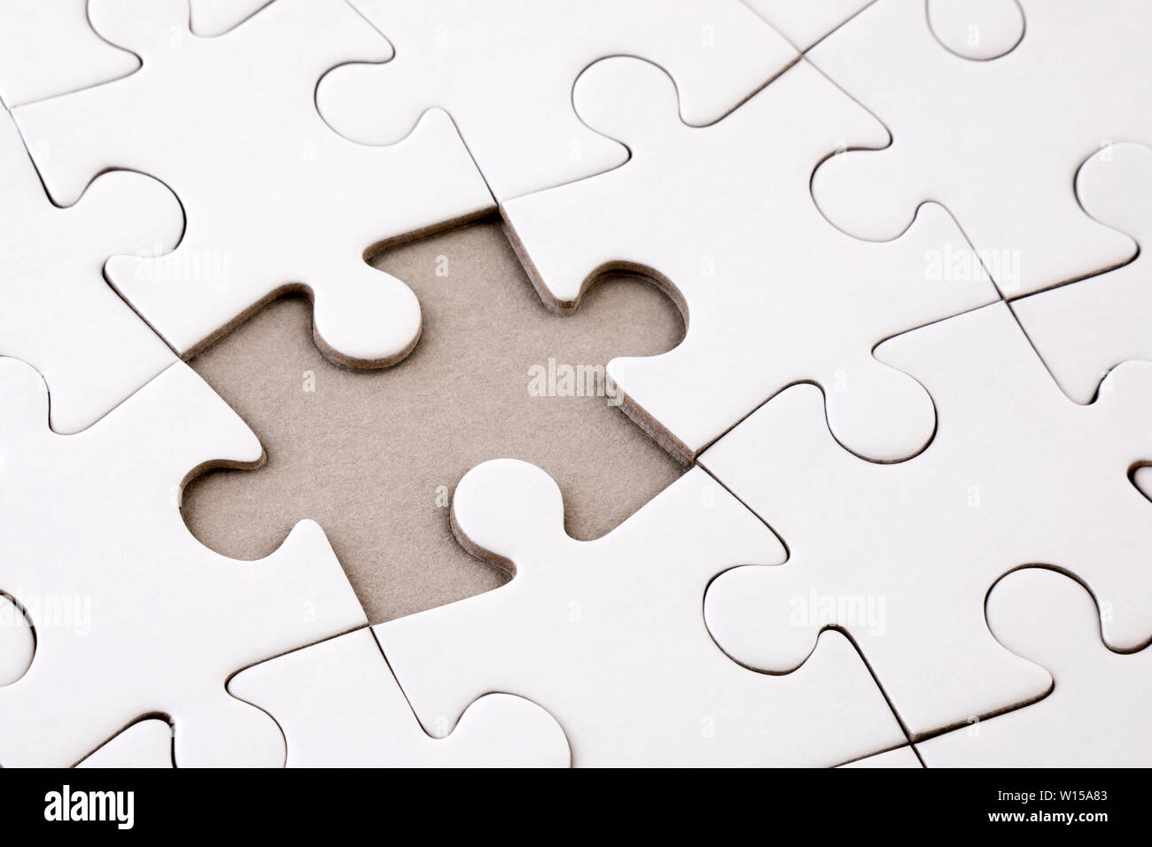 Last piece of jigsaw puzzle Stock Photo - Alamy