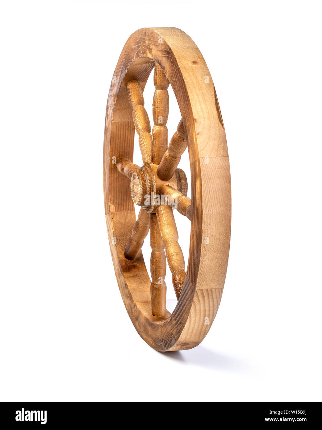 wooden wheel isolated on a white background Stock Photo - Alamy