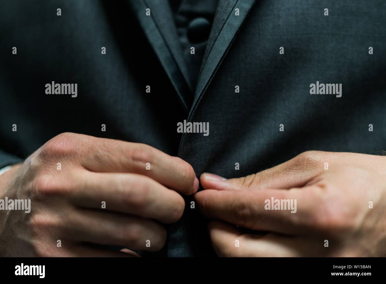 Jacket with blue buttons hi-res stock photography and images - Alamy