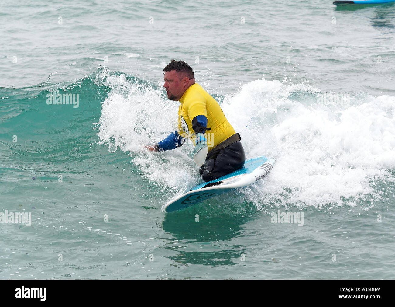 Fistral beach disabled surfing hi-res stock photography and images - Alamy