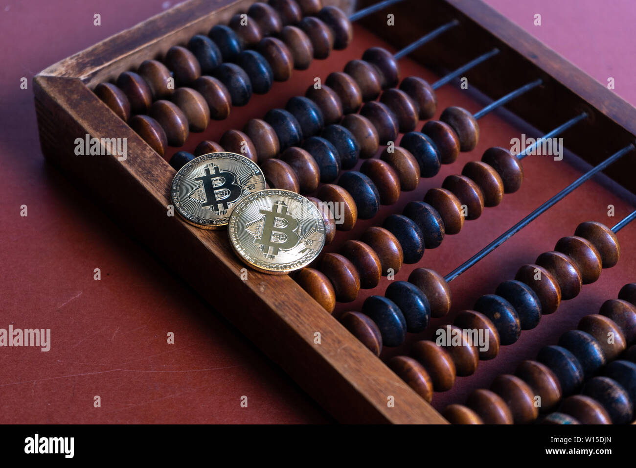 Golden coin and golden abacus hi-res stock photography and images - Alamy