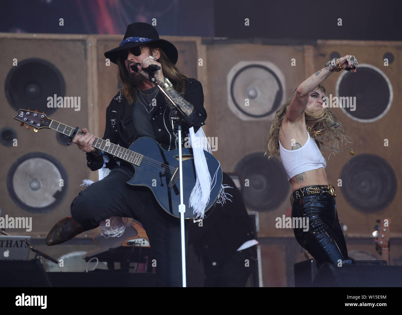 Miley Cyrus and her father Billy Ray Cyrus performing on the fifth day ...