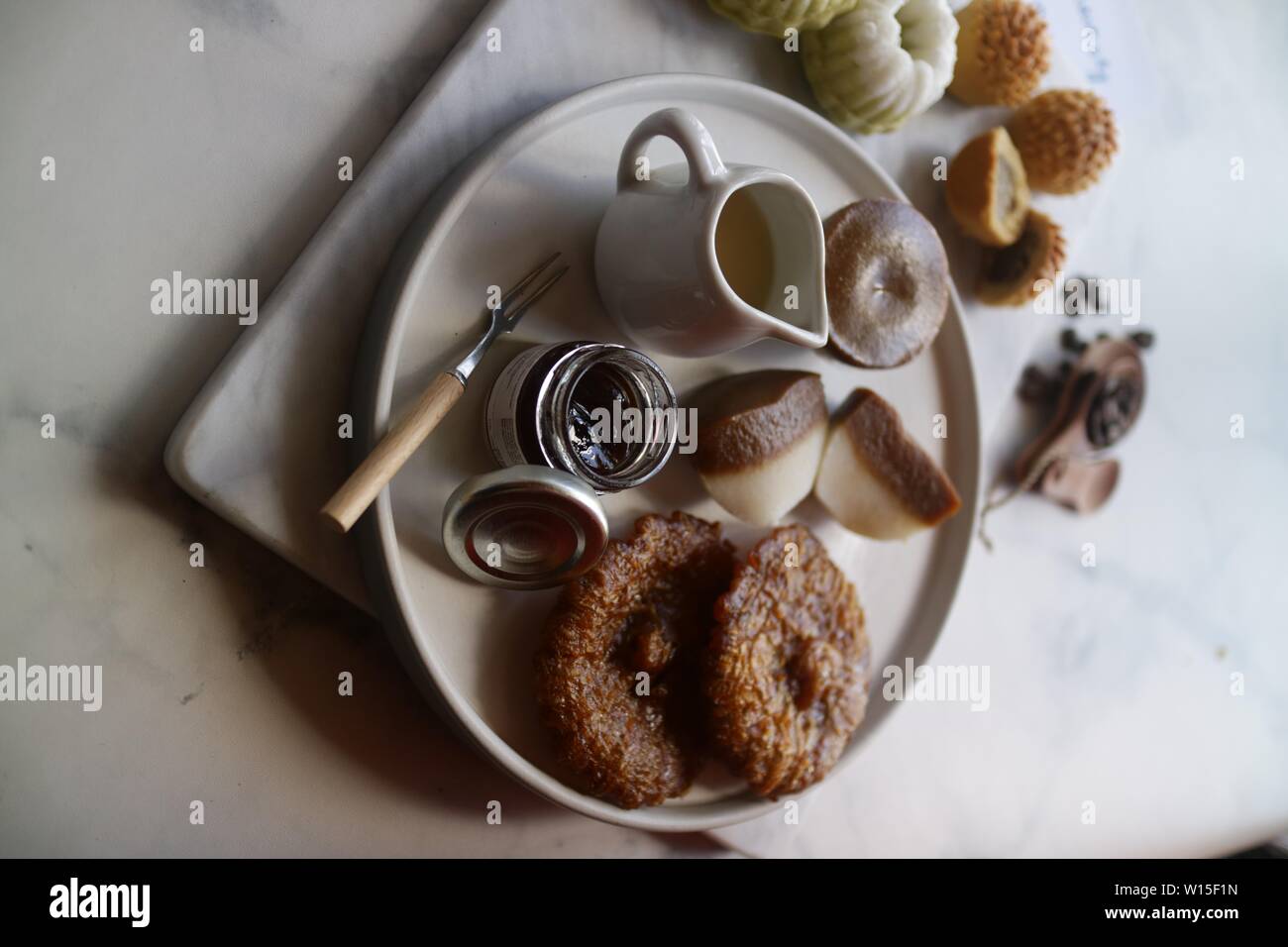 Closeup of different types of sweet in a plate served with jello and ...