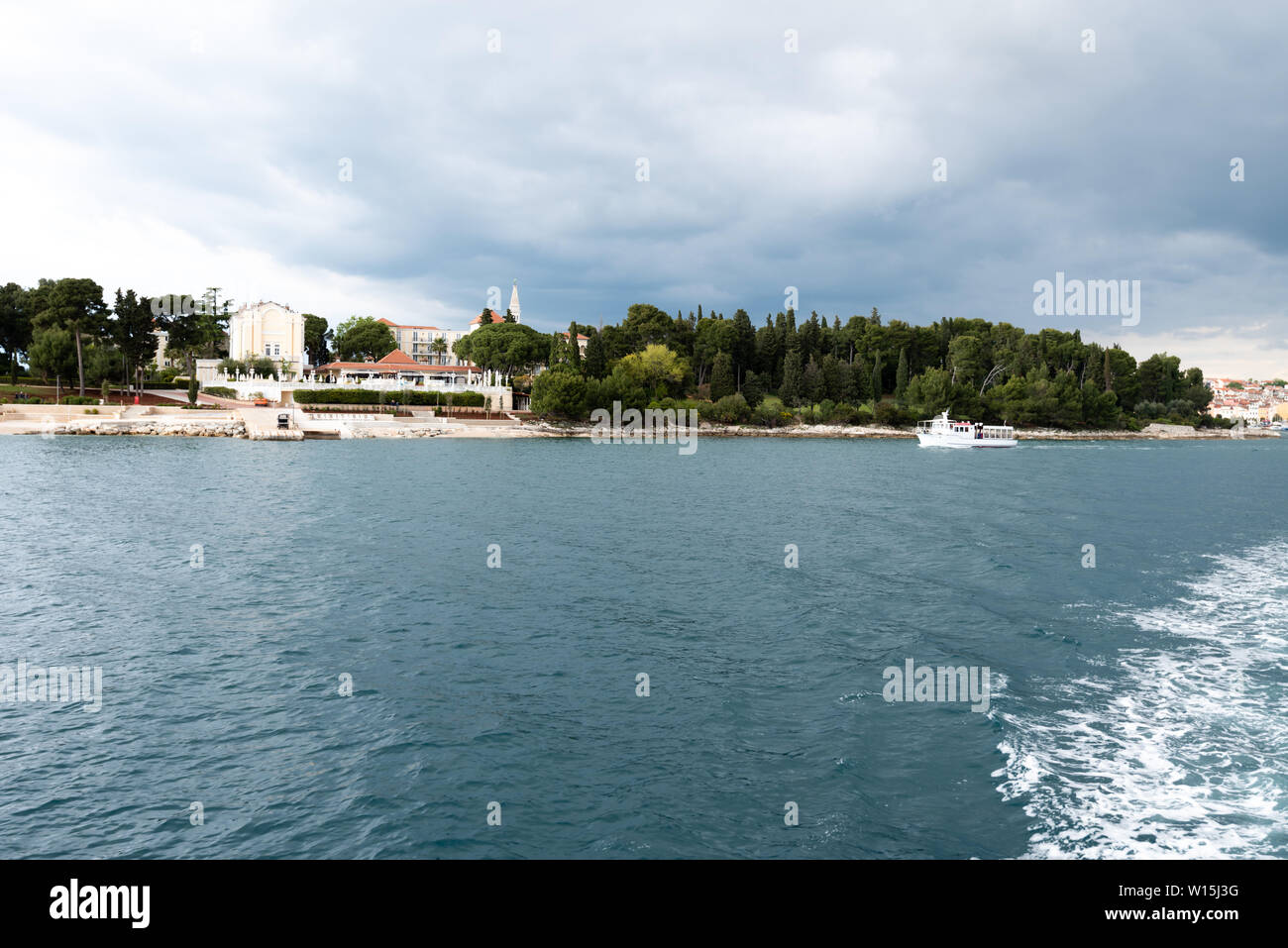 Red Island near Rovinj, Croatia with seaside holiday resort and beach ...
