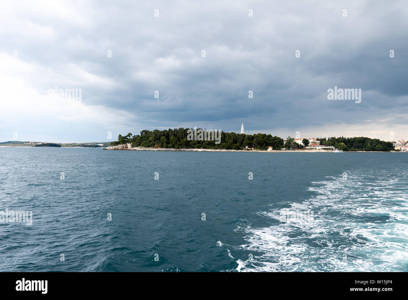 Red Island near Rovinj, Croatia with seaside holiday resort and beach ...