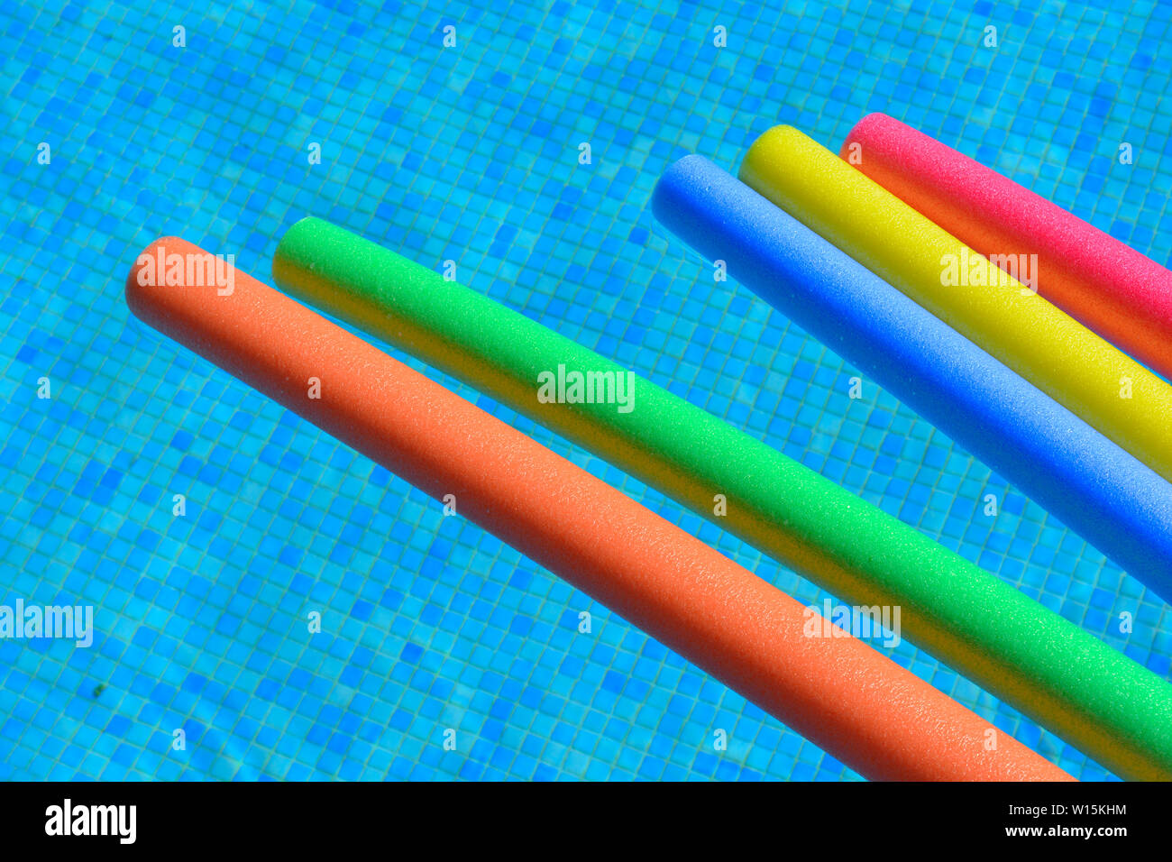 Green swim noodle hi-res stock photography and images - Alamy