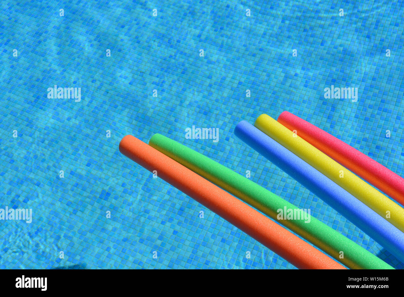 Colorful foam swim noodles hi-res stock photography and images - Alamy