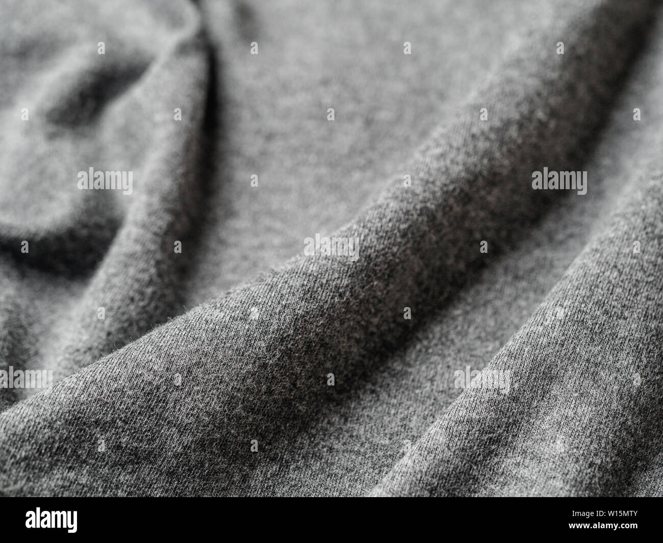 Gray cotton fabric texture. Clothes cotton jersey background with folds ...