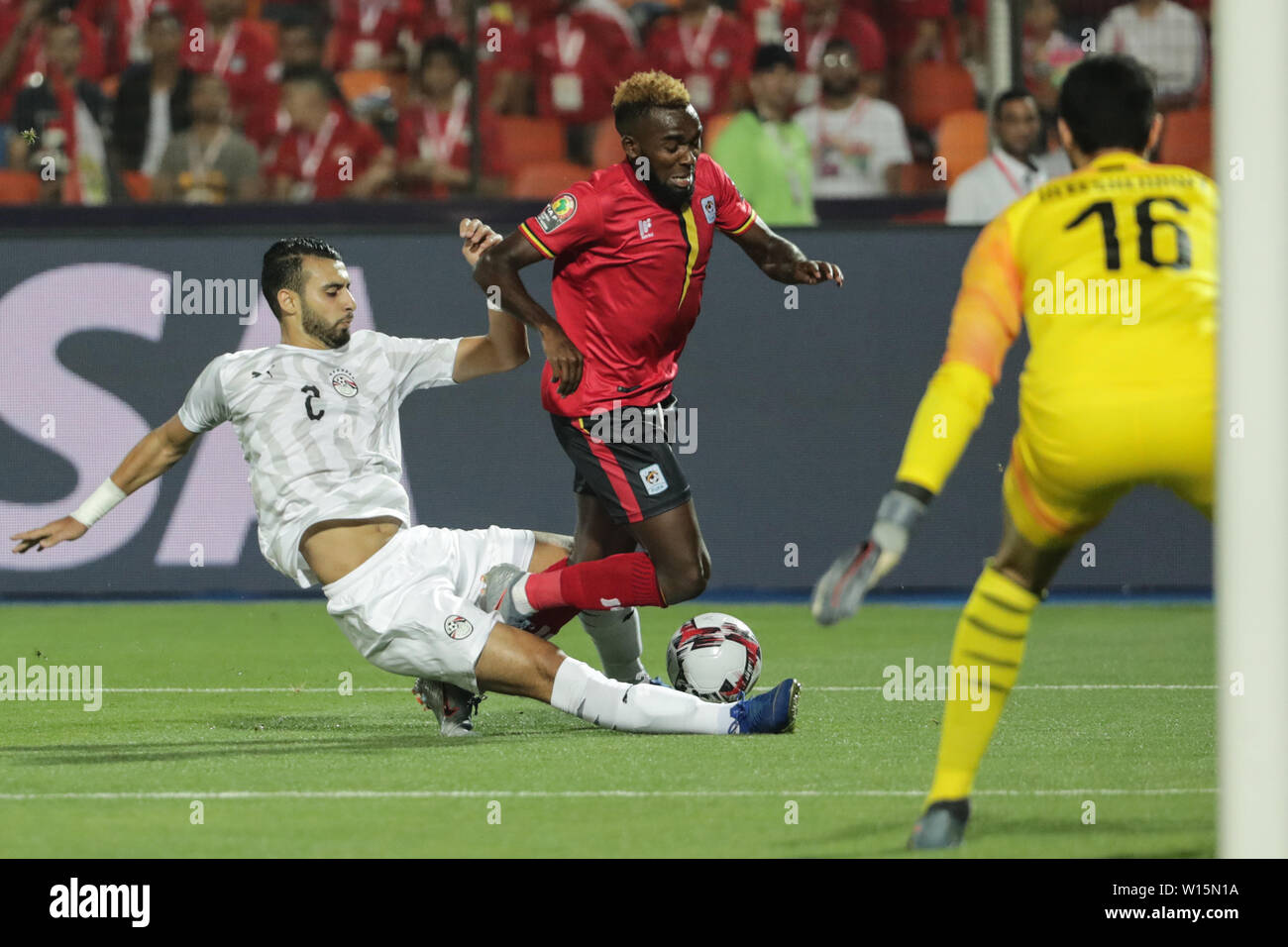 Cairo, Egypt. 30th June, 2019. Egypt's Baher El Mohamady (L) and Uganda ...