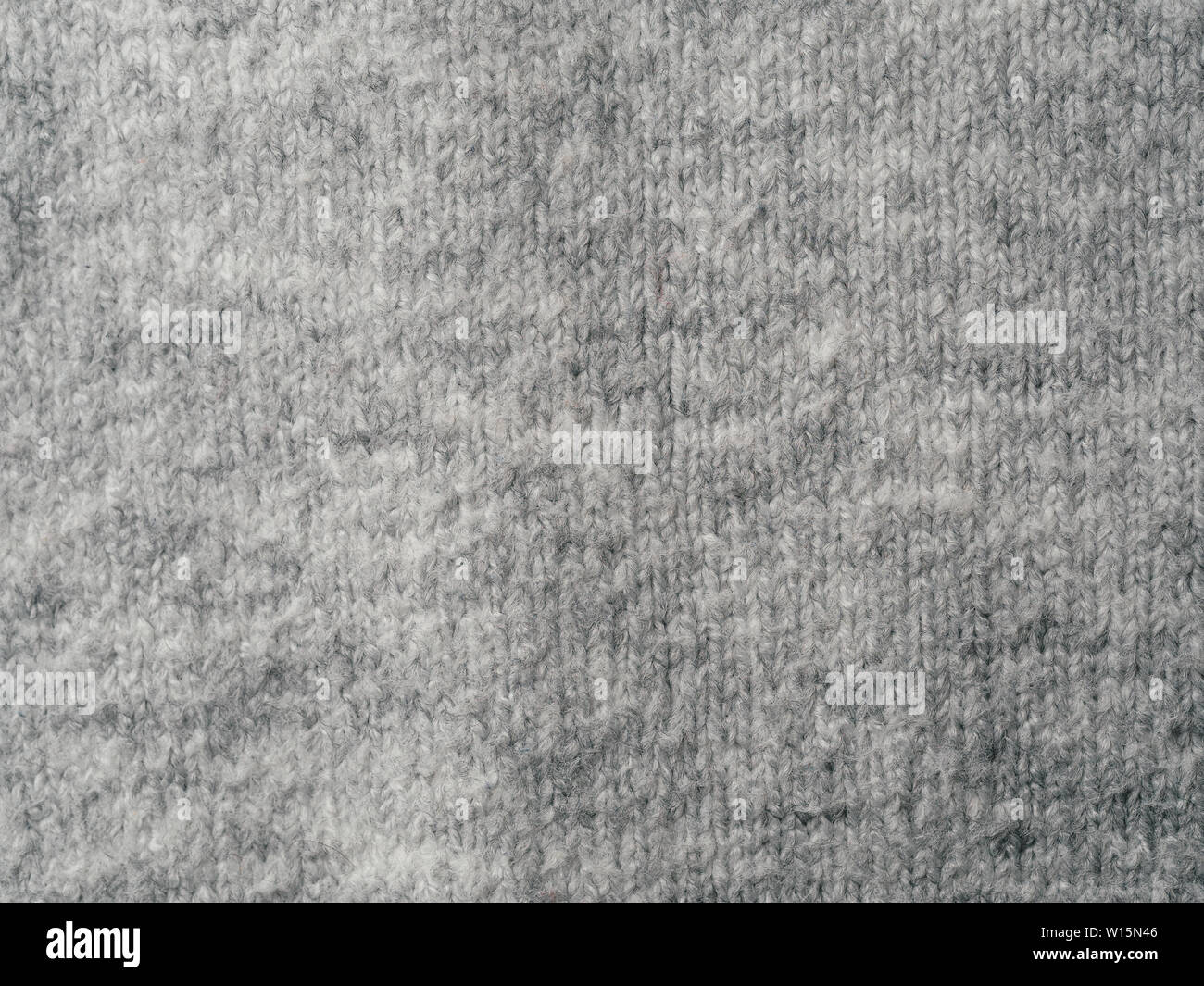 Gray sweater fabric texture. Clothes sweater background with folds ...