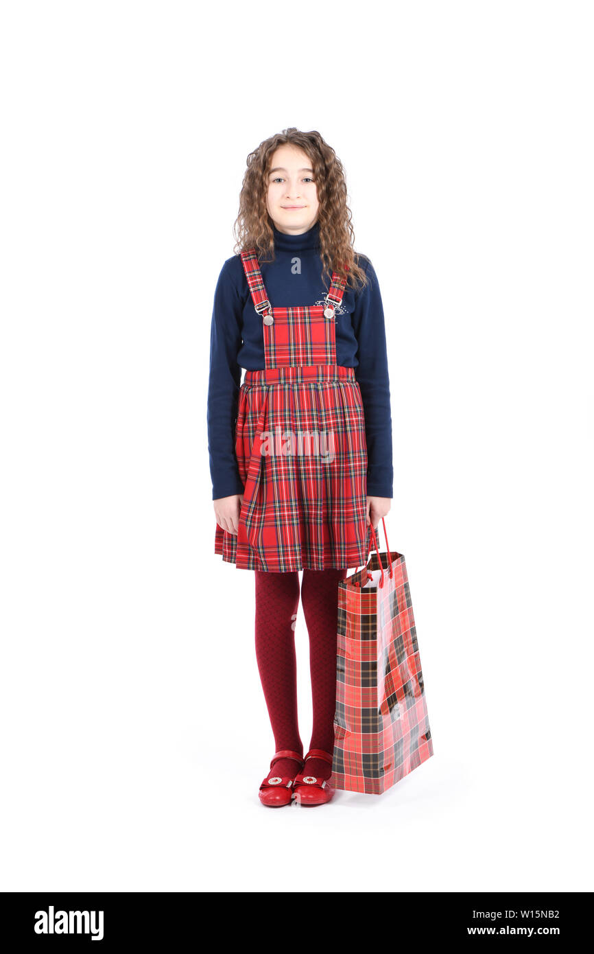 Child with a red packet isolated on white background. Little beauty ...