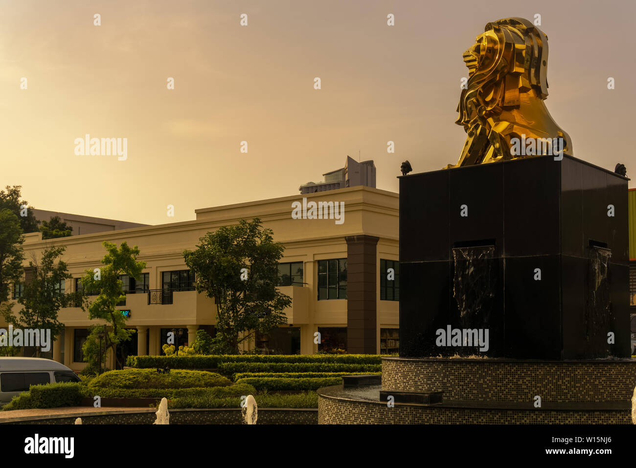 The statue of a big lion is watching the area Stock Photo - Alamy