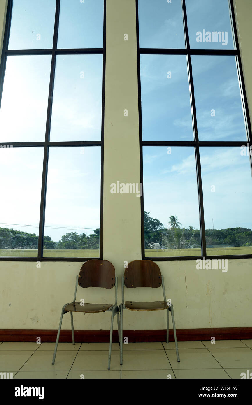 Old vintage two Chairs with beautiful window views Stock Photo - Alamy